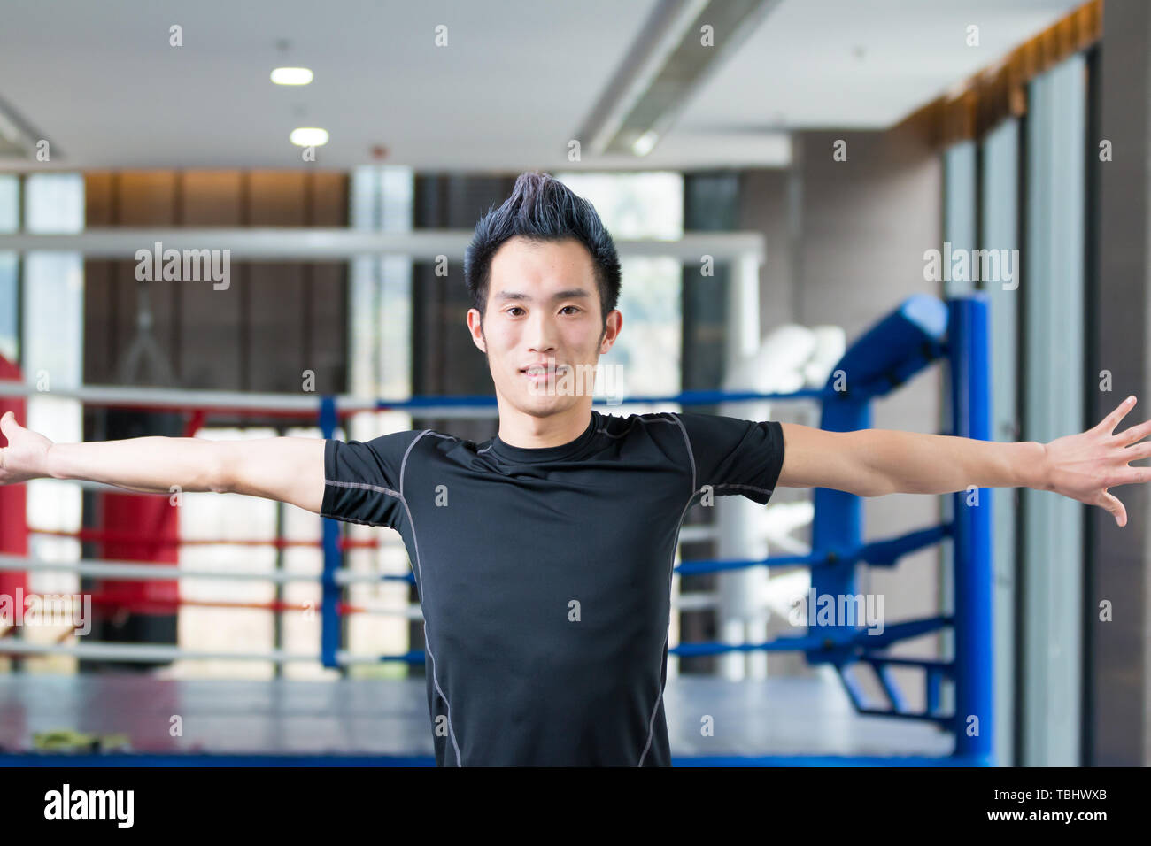 Young chinese man exercising gym hi-res stock photography and images ...