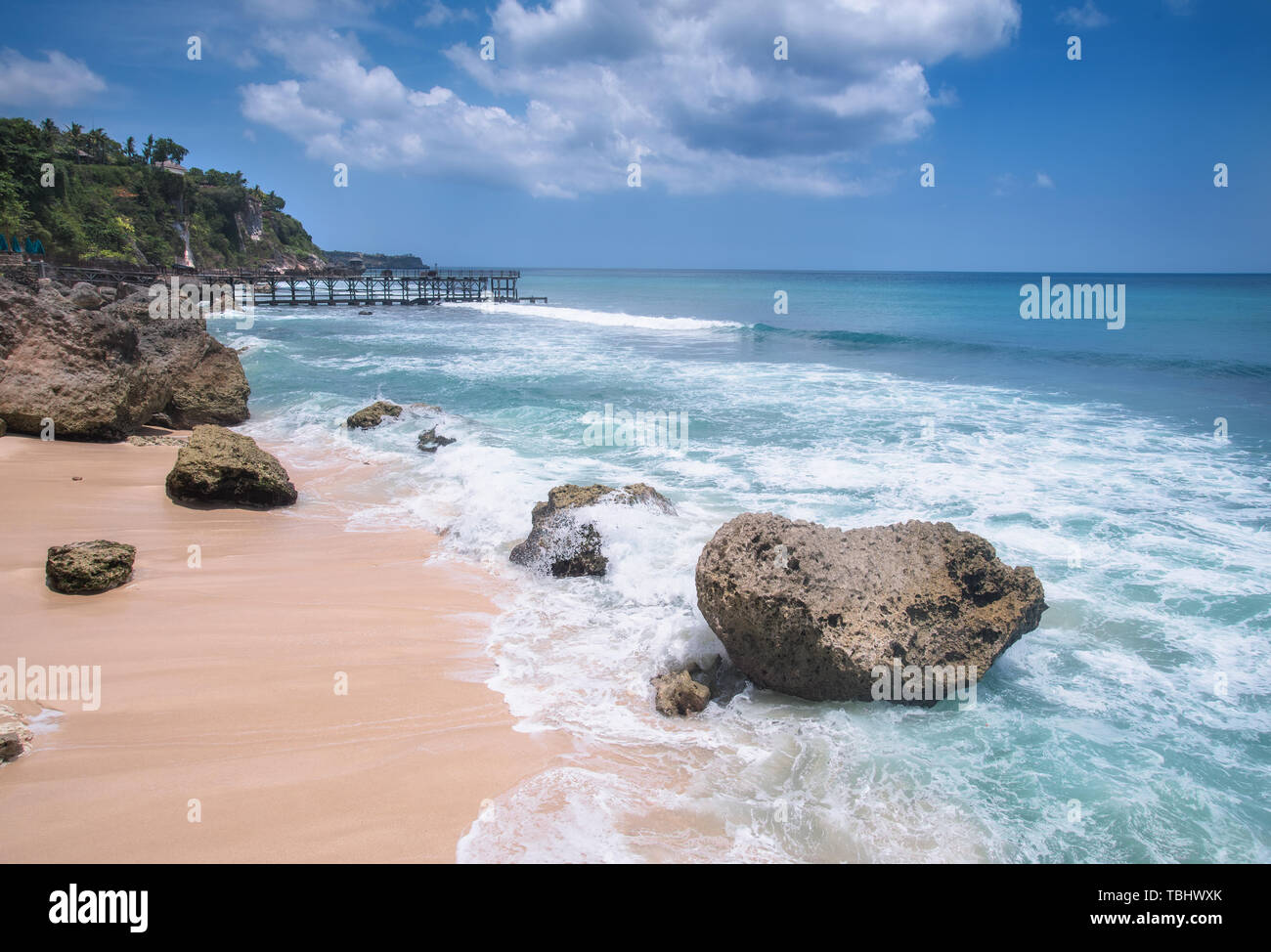 Bali blue sky and white clouds under Indian Ocean resort hotel waves ...