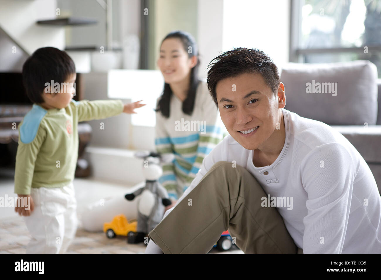 Parents and children play games Stock Photo - Alamy