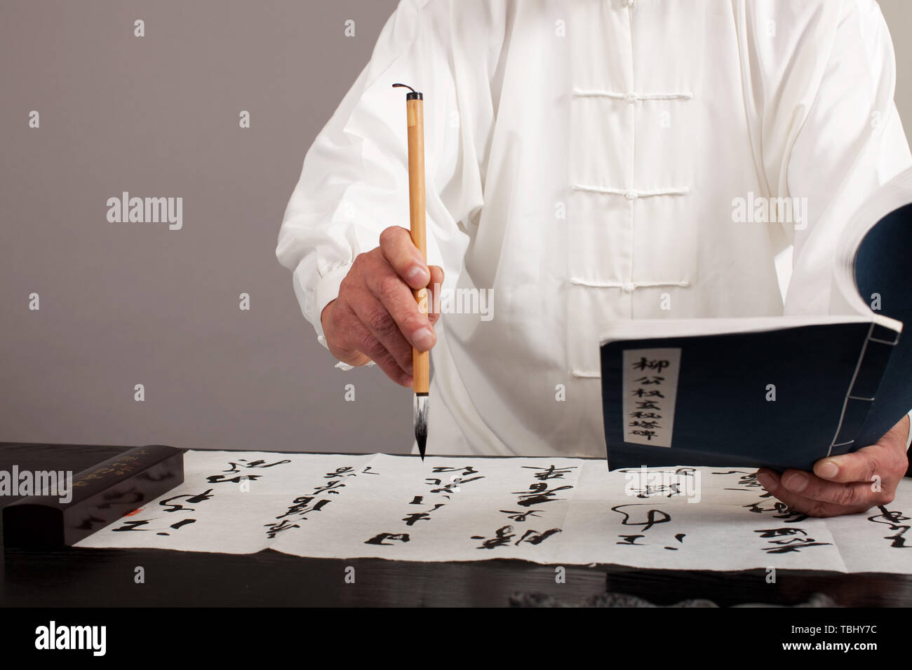 Ancient chinese book calligraphy brush hi-res stock photography and ...