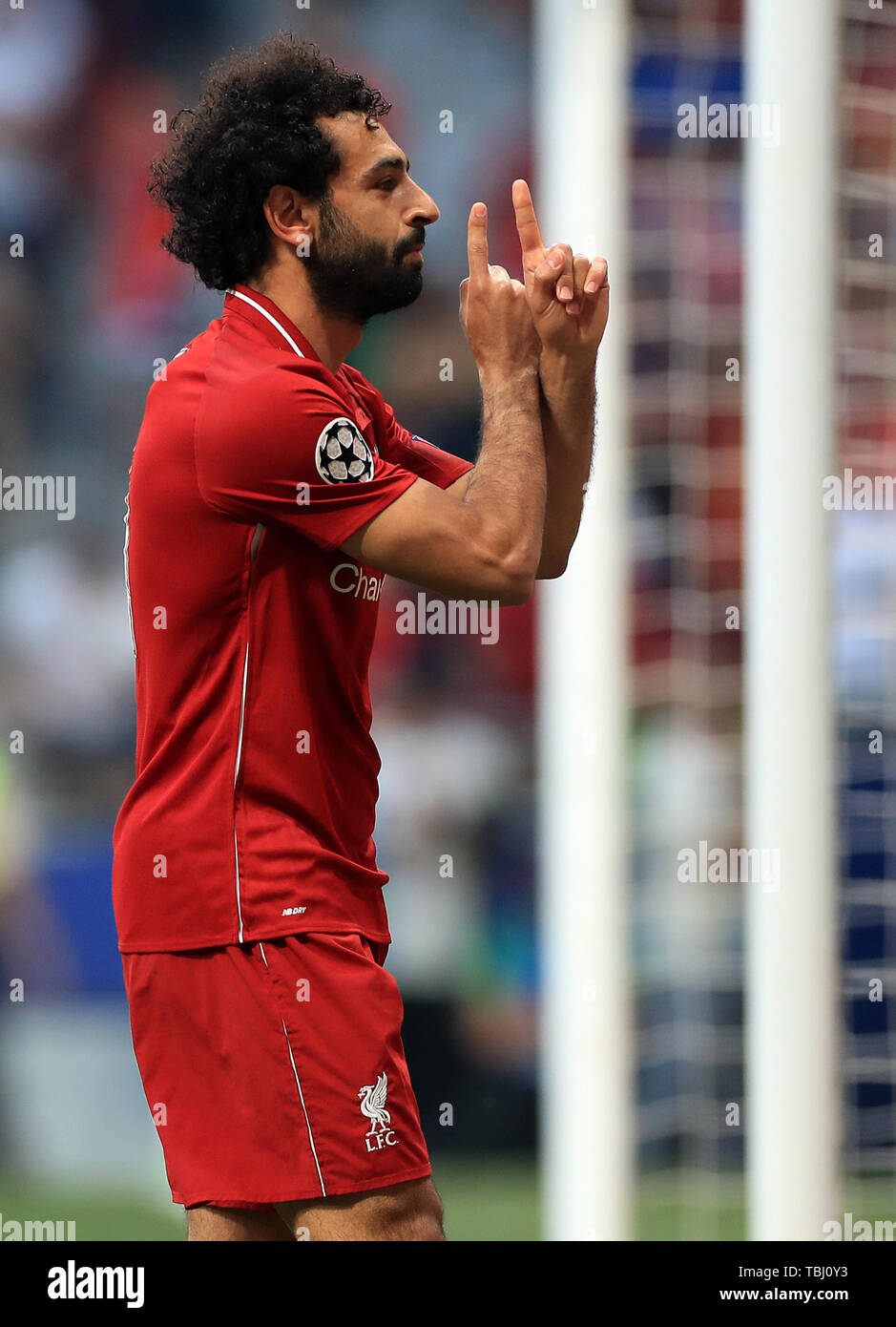 Liverpool's Mohamed Salah celebrates scoring his side's first goal of ...