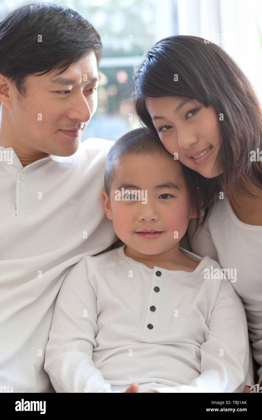 A family of three Stock Photo - Alamy