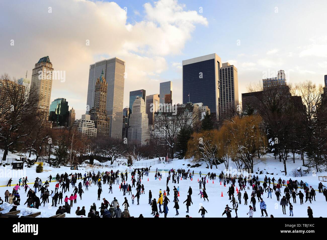 NEW YORK CITY, NY - JAN 1: People skate on ice with white Christmas in ...