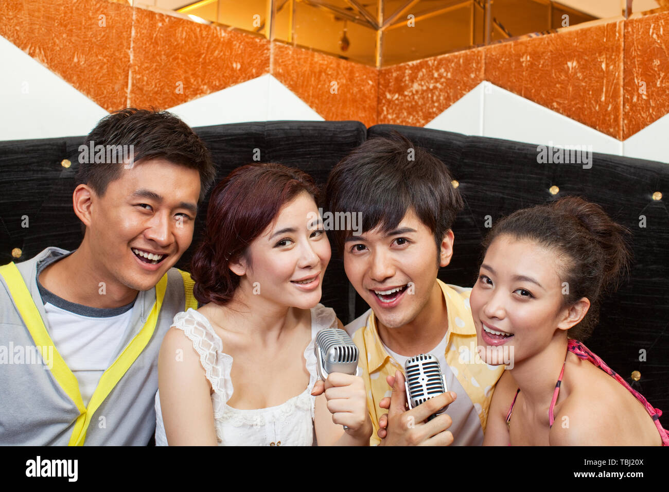 Four friends, party, party Stock Photo - Alamy