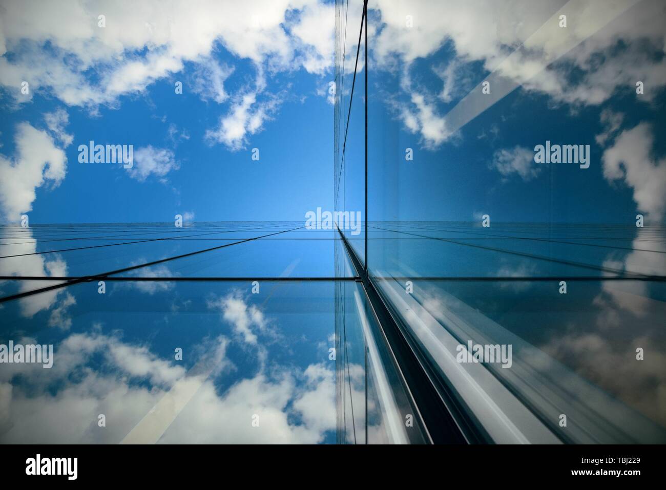 Glass reflection of skyscraper in Paris Stock Photo - Alamy
