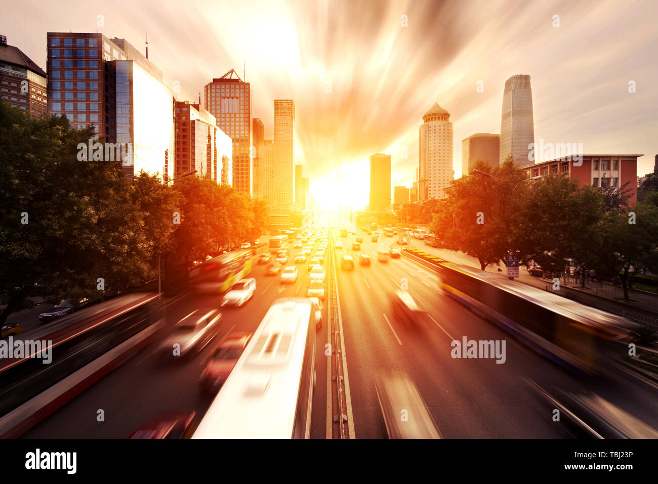 Modern cityscape in the sunset Stock Photo - Alamy
