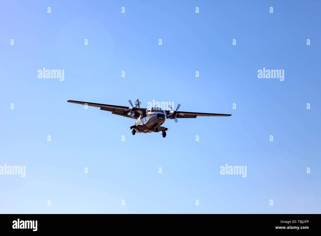 A small aircraft for the transport of passengers and paratroopers lands ...