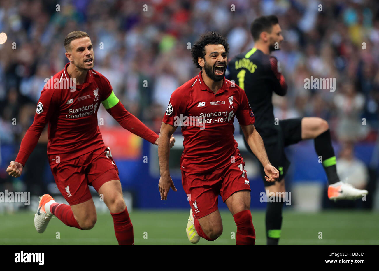 Liverpool's Mohamed Salah celebrates scoring his side's first goal of ...
