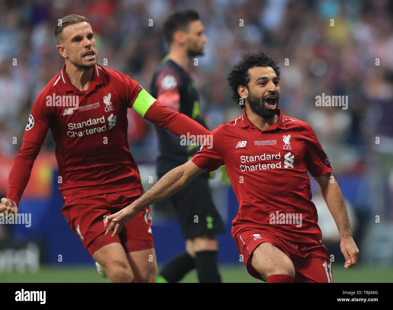 Liverpool's Mohamed Salah celebrates scoring his side's first goal of ...