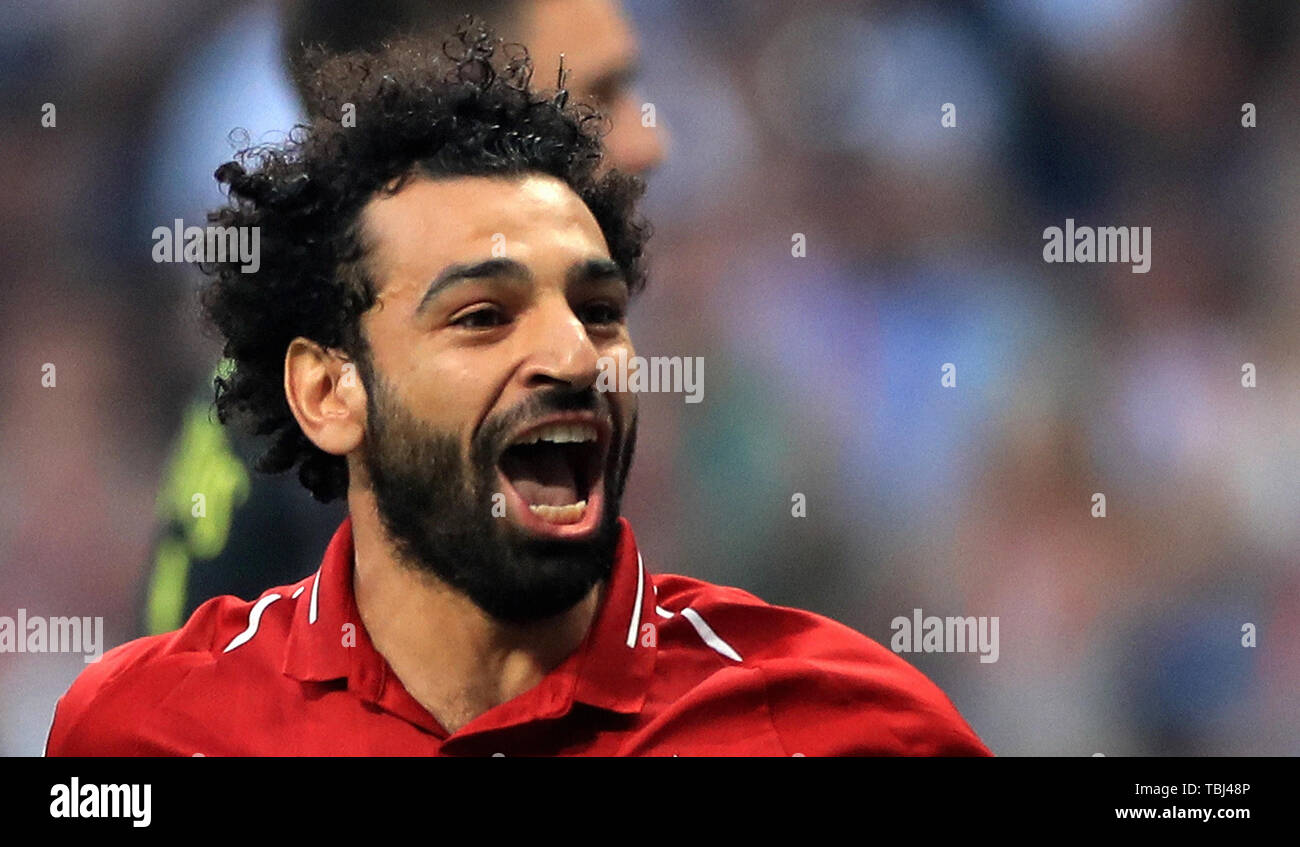 Liverpool's Mohamed Salah celebrates scoring his side's first goal of ...