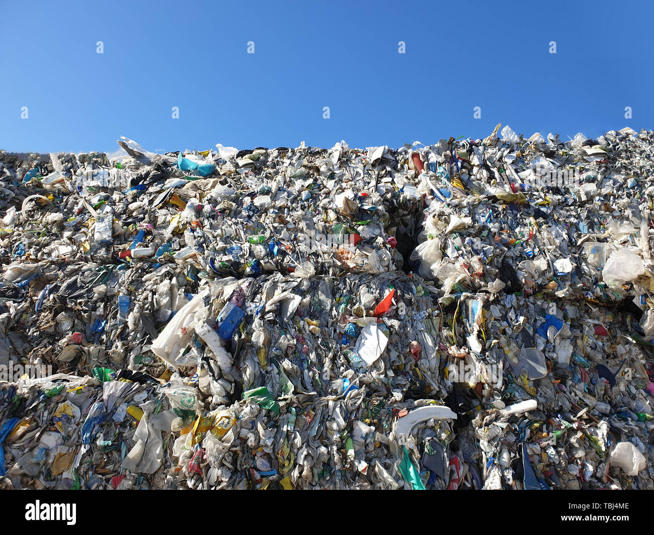 Stack of paper and cardboard garbage at recycling plan Stock Photo - Alamy