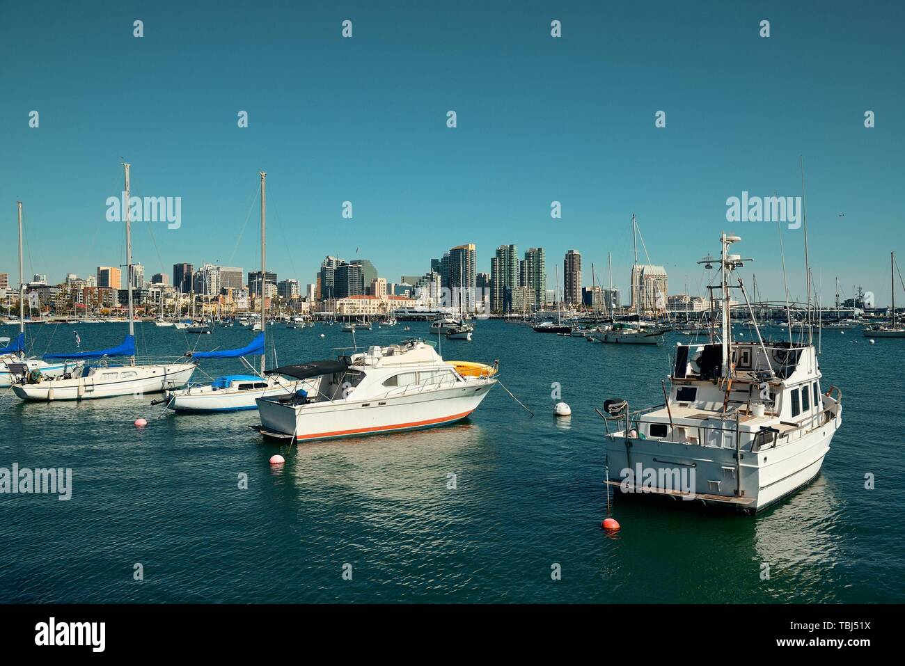 San Diego downtown with boat in bay Stock Photo - Alamy