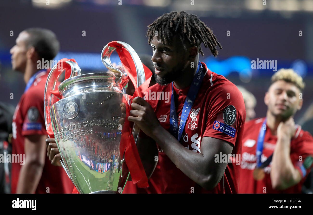 Liverpool's Divock Origi celebrates with the trophy after winning the ...