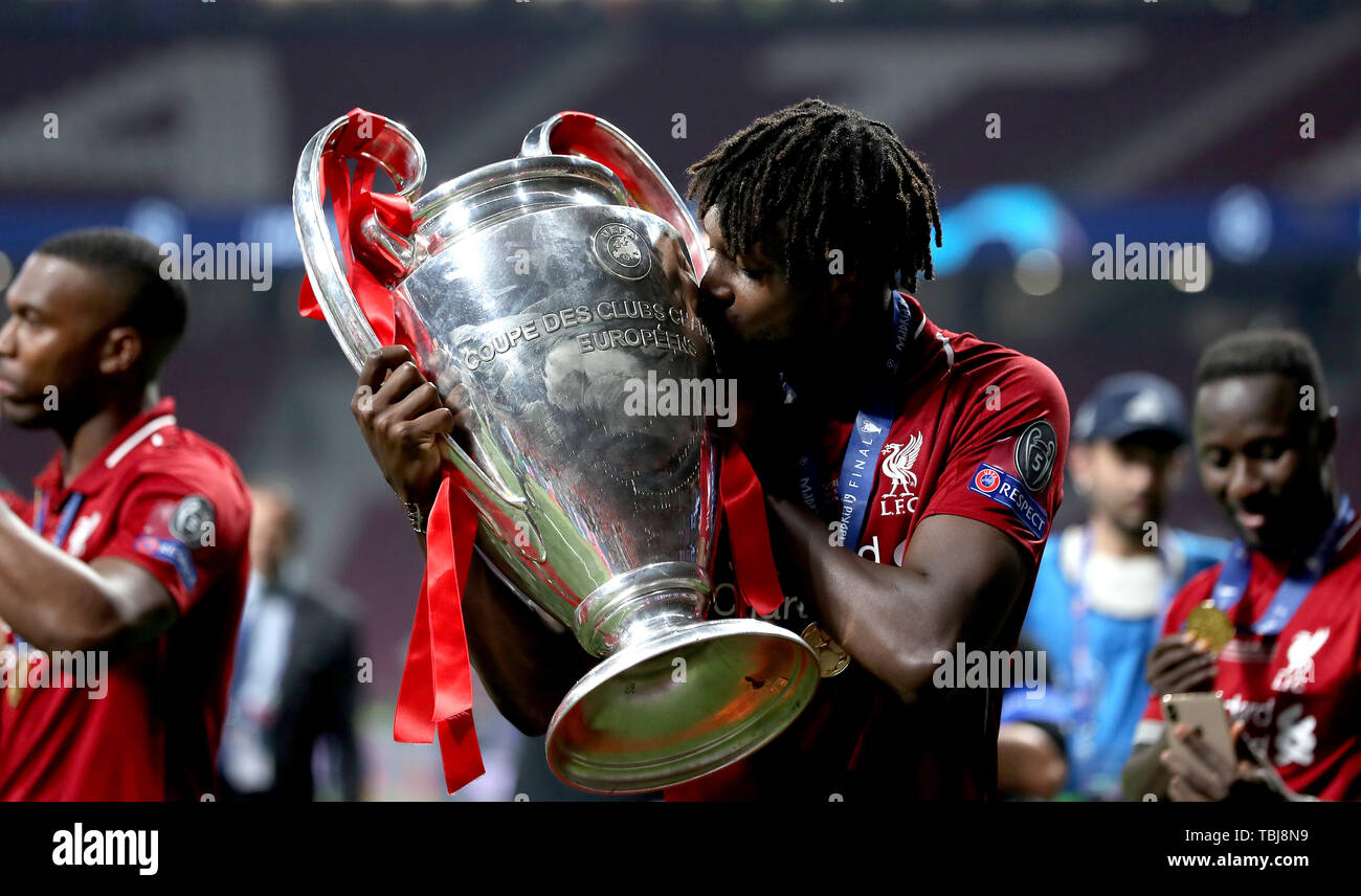 Liverpool's Divock Origi celebrates with the trophy after the UEFA ...