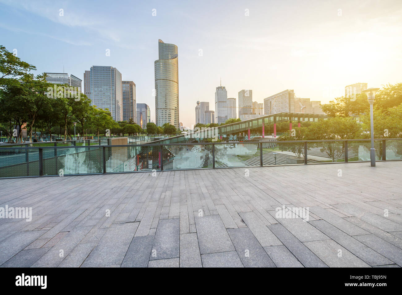 modern square and skyscrapers under sunbeam Stock Photo - Alamy