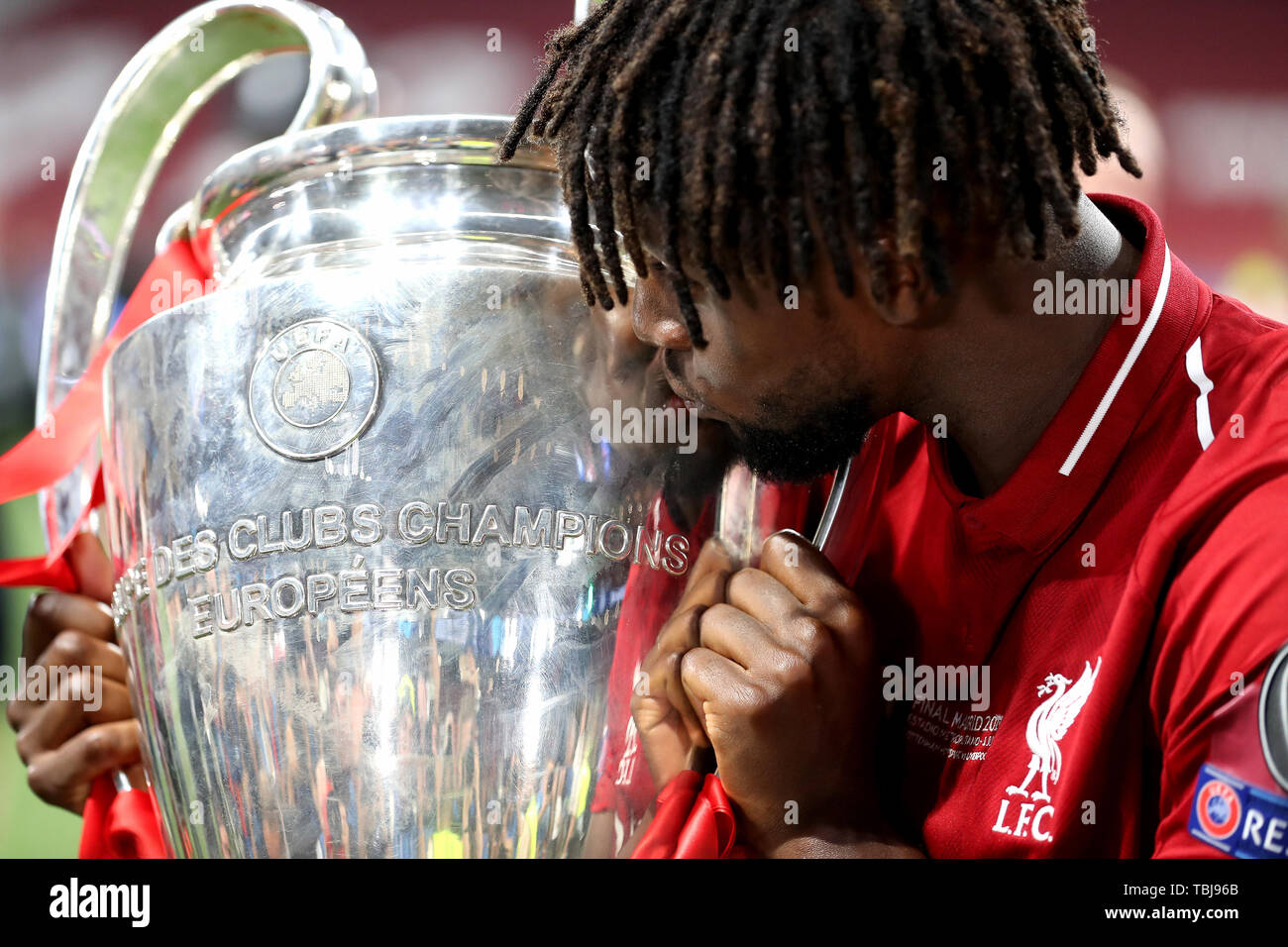 Liverpool's Divock Origi celebrates with the trophy after the UEFA ...