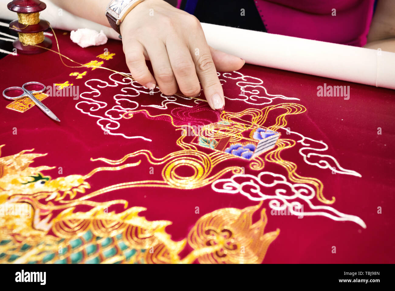 Old woman embroidering hi-res stock photography and images - Alamy