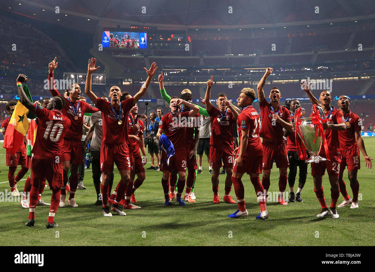 Liverpool players celebrate with the trophy after winning the UEFA ...