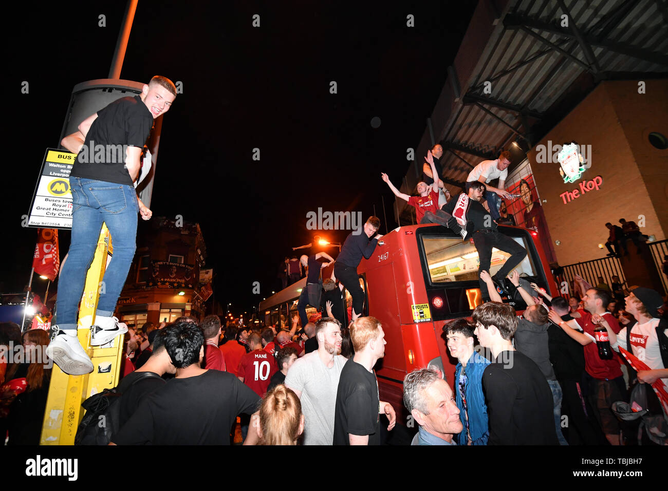 Liverpool fans celebrate their sides victory over Tottenham Hotspur's ...