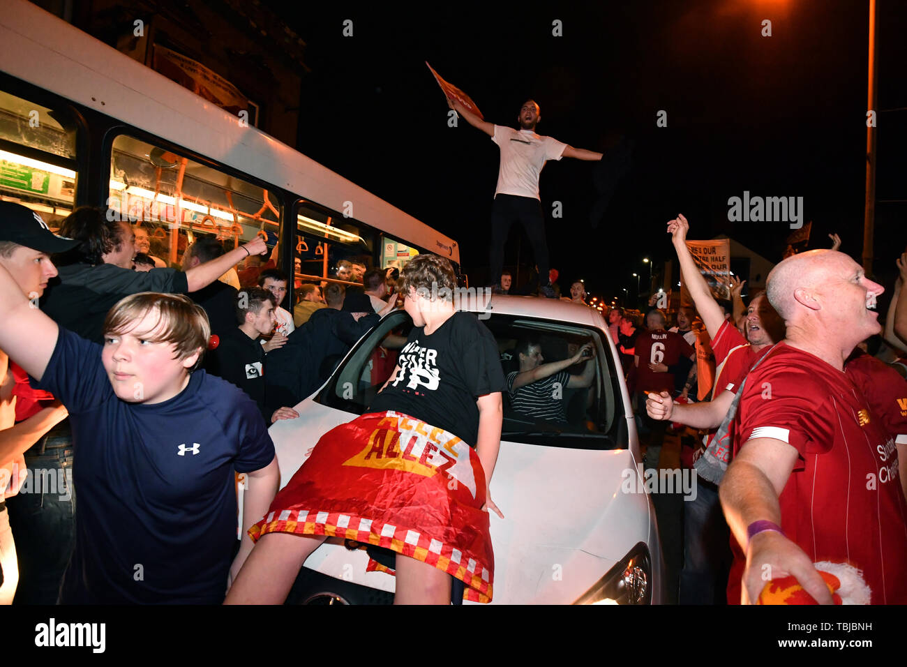 Liverpool fans celebrate their sides victory over Tottenham Hotspur's ...