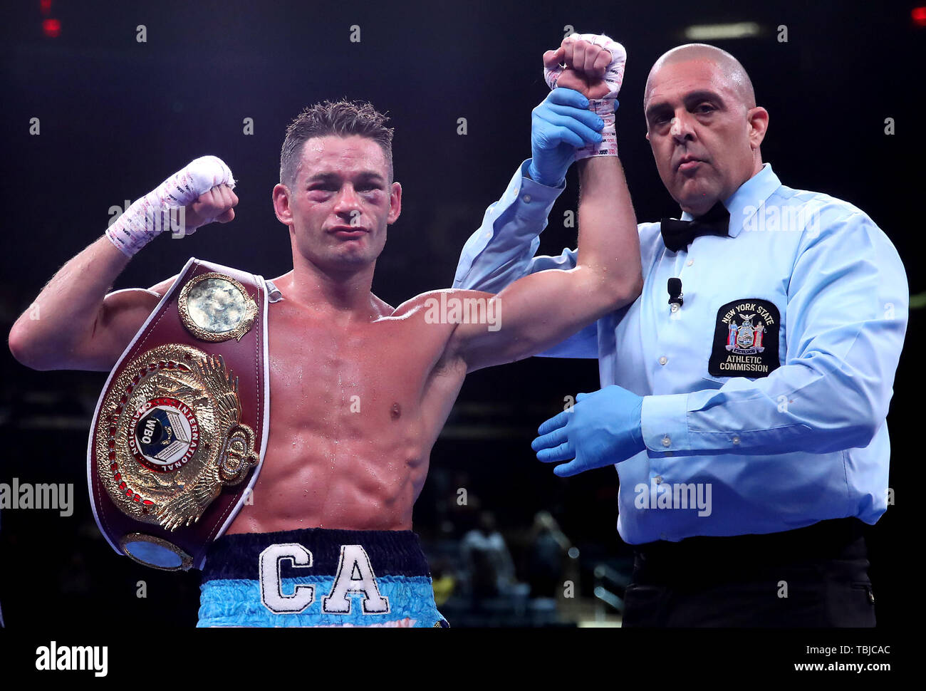Chris Algieri (left) celebrates winning the WBA International Super ...