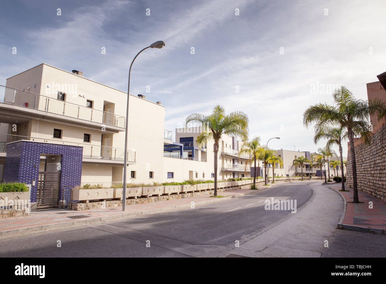 roadside view of buildings in spain Stock Photo - Alamy