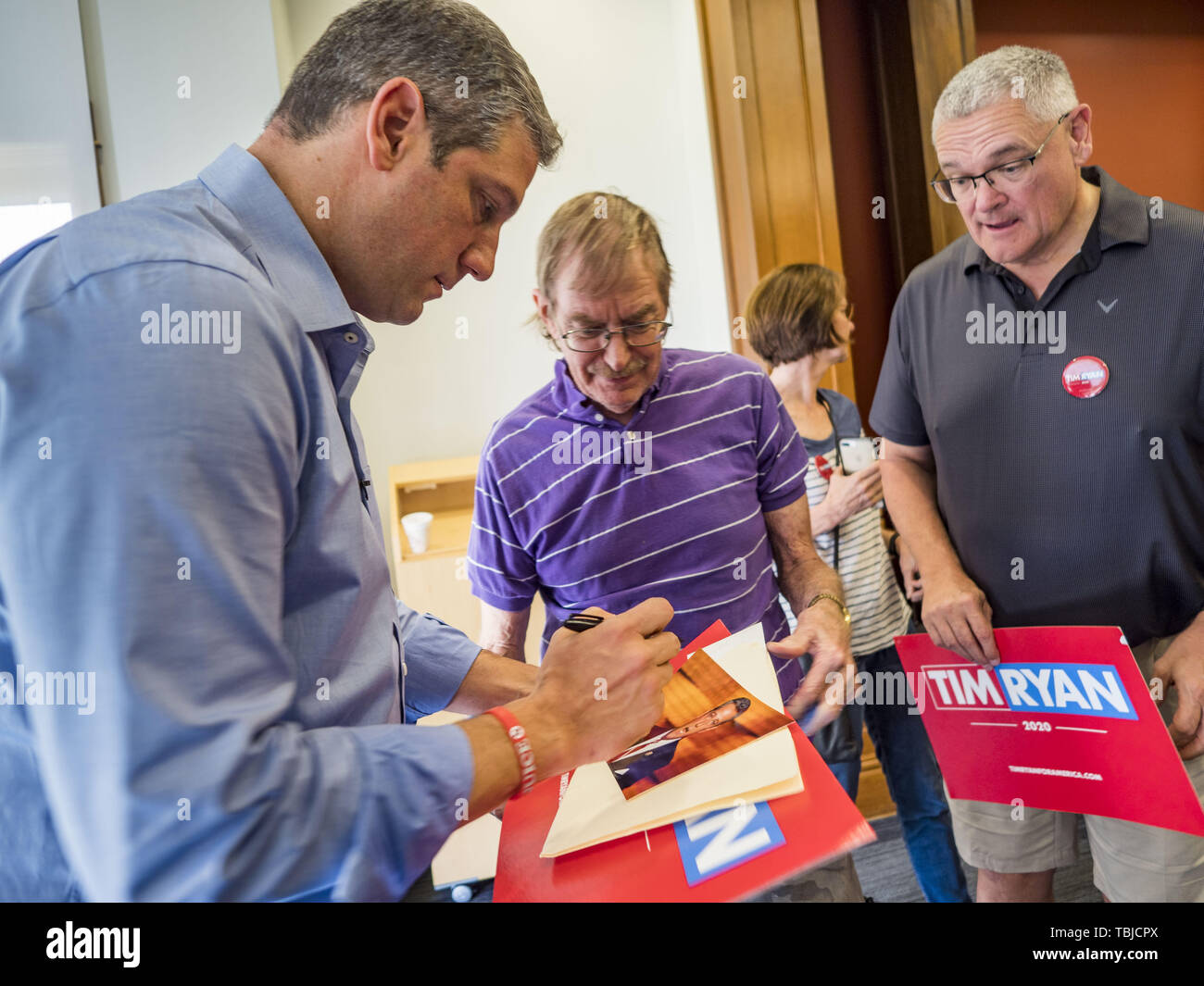 Ames, Iowa, USA. 1st June, 2019. Congressman TIM RYAN (D-OH) signs ...