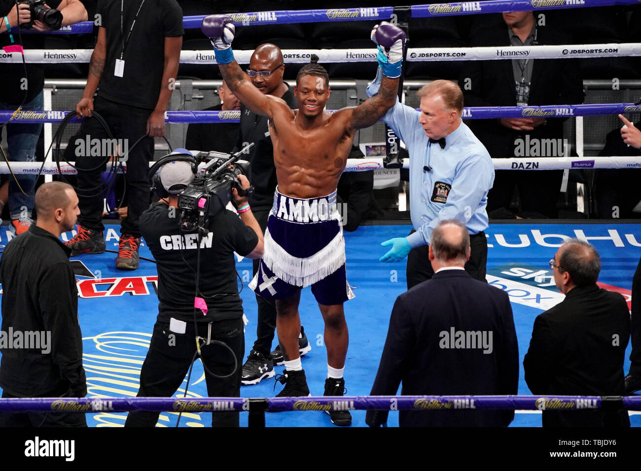 New York, USA. 1st June, 2019. AUSTIN WILLIAMS (purple and white trunks ...
