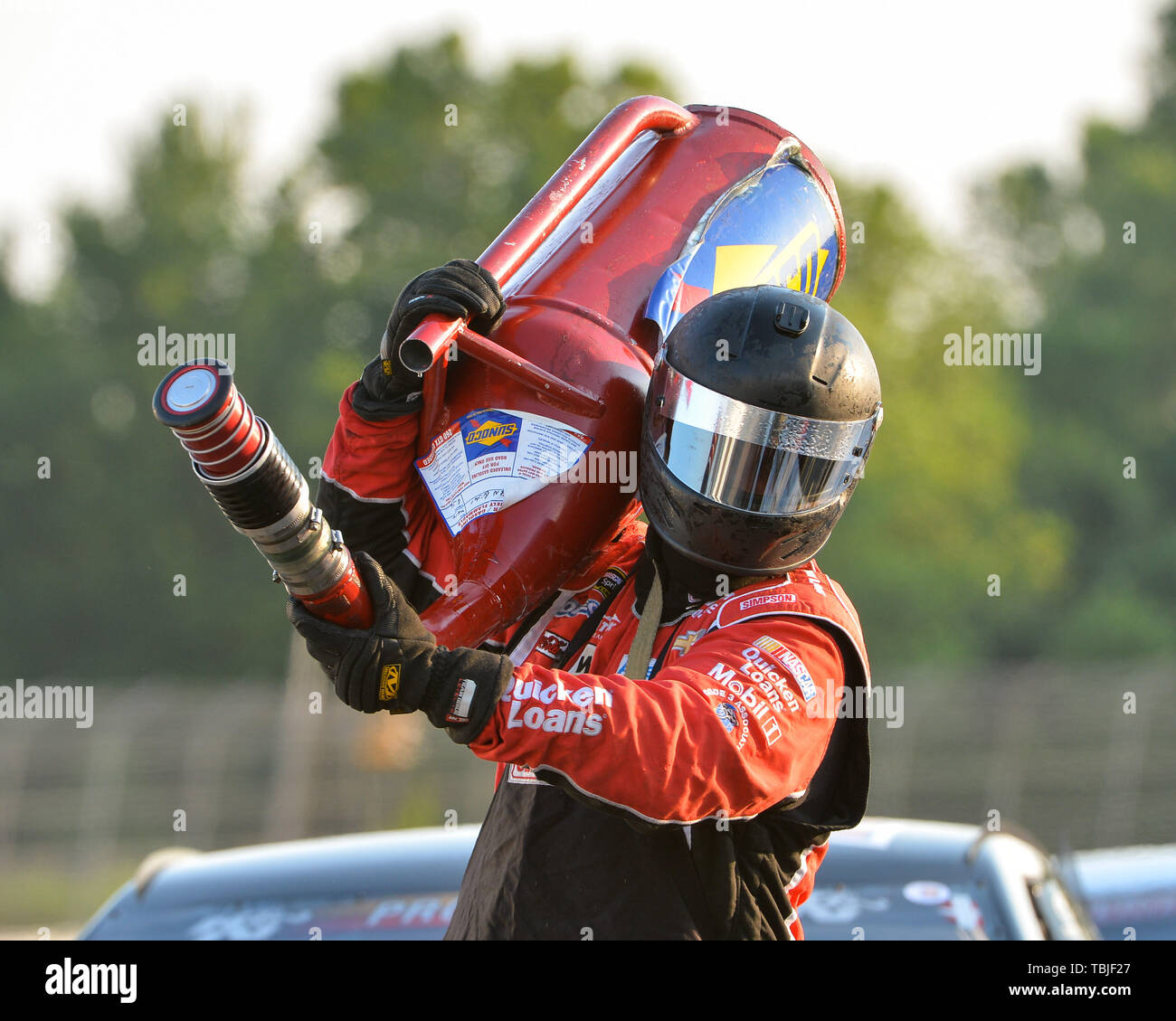 Memphis, TN, USA. 01st June, 2019. A pit crew member carries a fuel ...