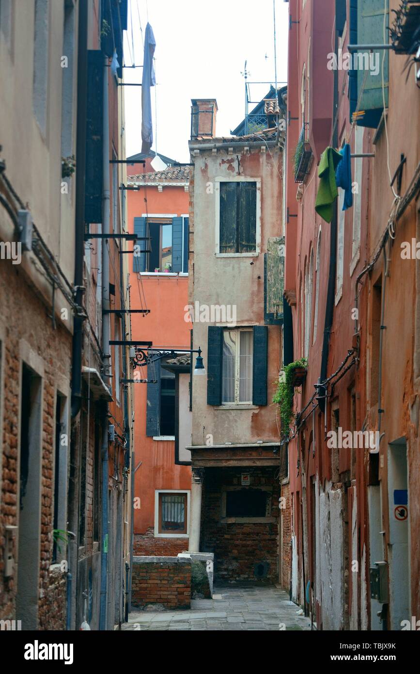 Alley view with historical buildings in Venice, Italy Stock Photo - Alamy