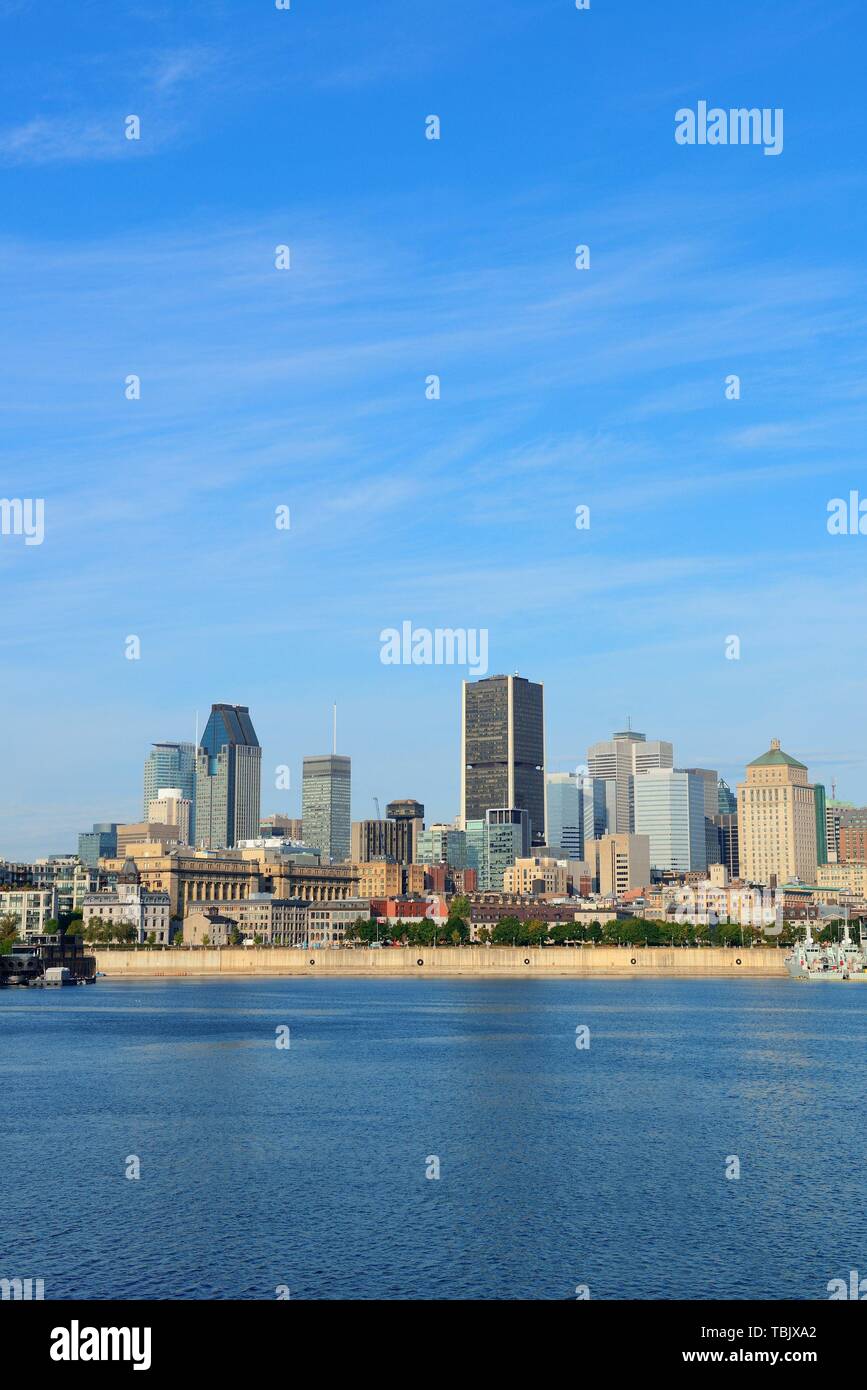 Montreal city skyline over river in the day with urban buildings Stock ...