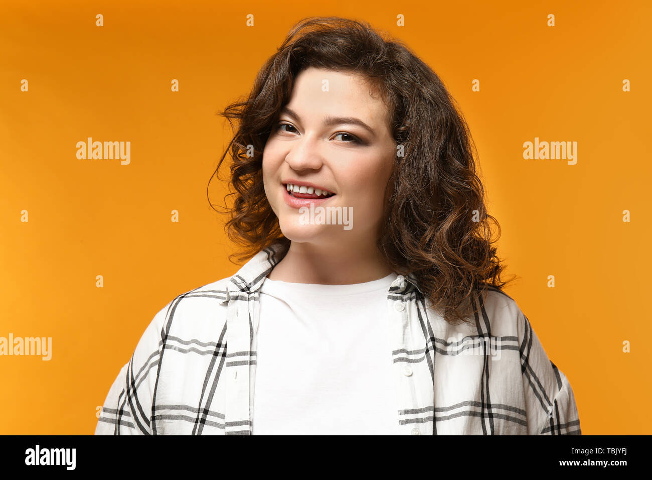 Portrait of overweight woman on color background Stock Photo - Alamy