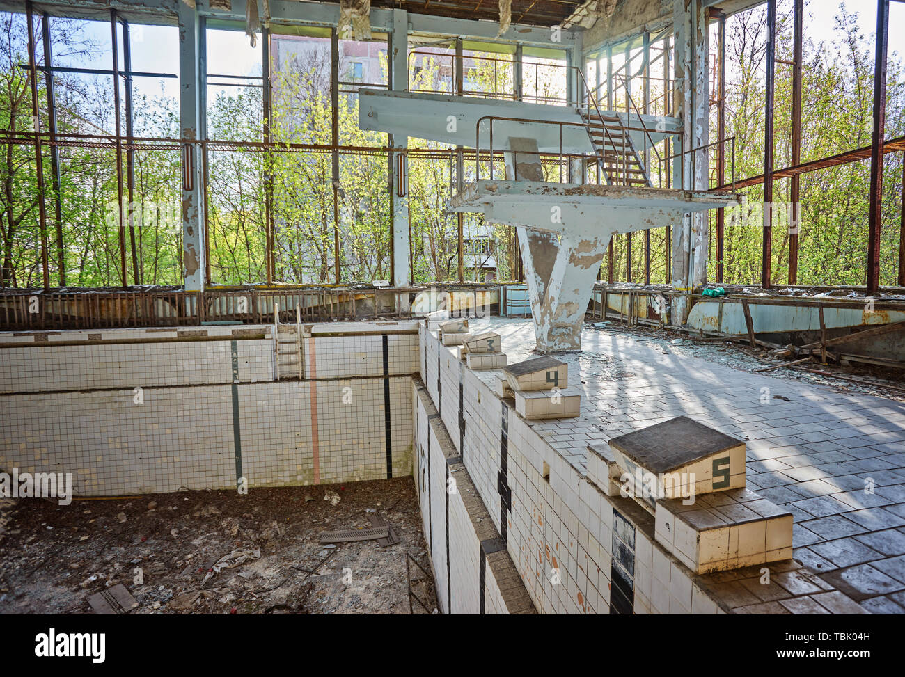 Abandoned swimming pool in Pripyat. Destroyed gym in a radioactive city ...
