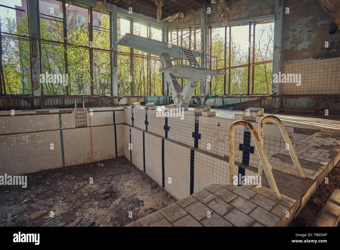 Abandoned swimming pool in Pripyat. Destroyed gym in a radioactive city ...