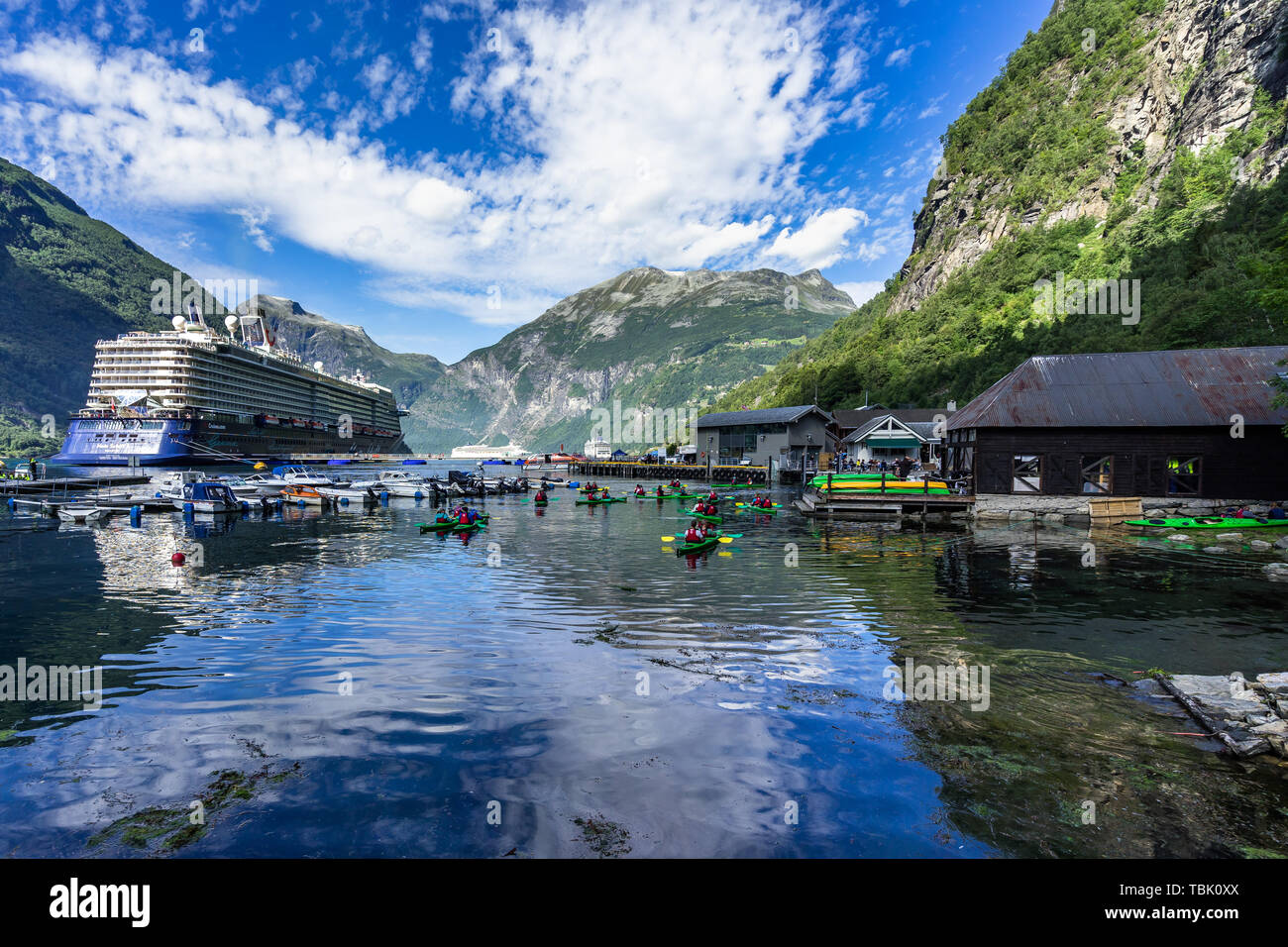 Tourists in Geiranger port ready to kayaking in the beautiful scenery ...
