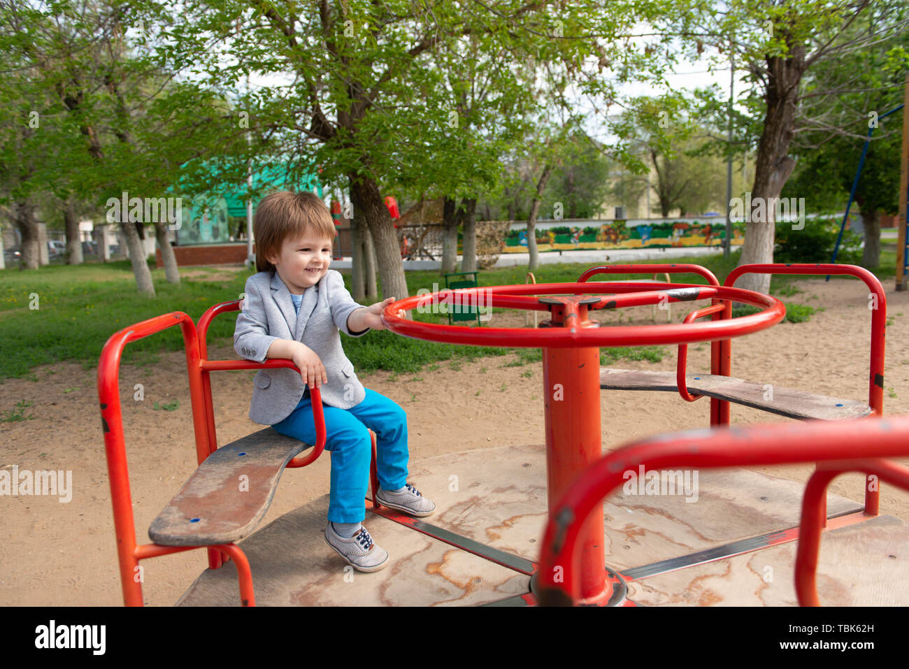 Playground with rides hi-res stock photography and images - Alamy
