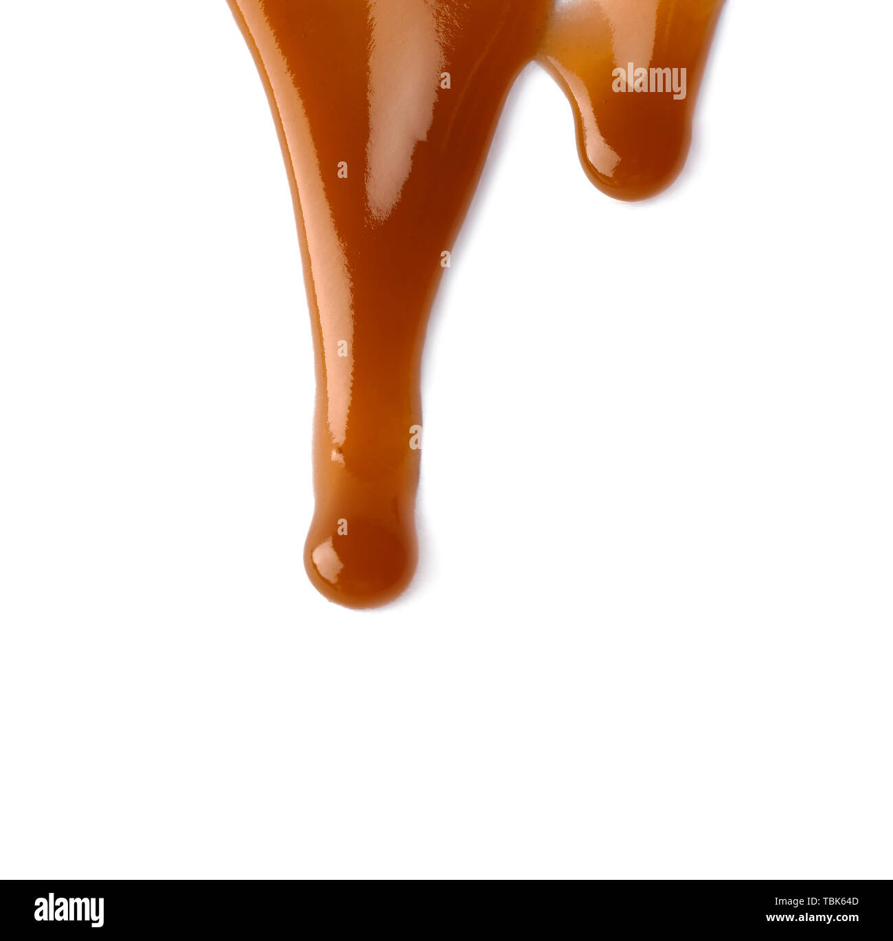 Stains of liquid caramel on white background Stock Photo - Alamy