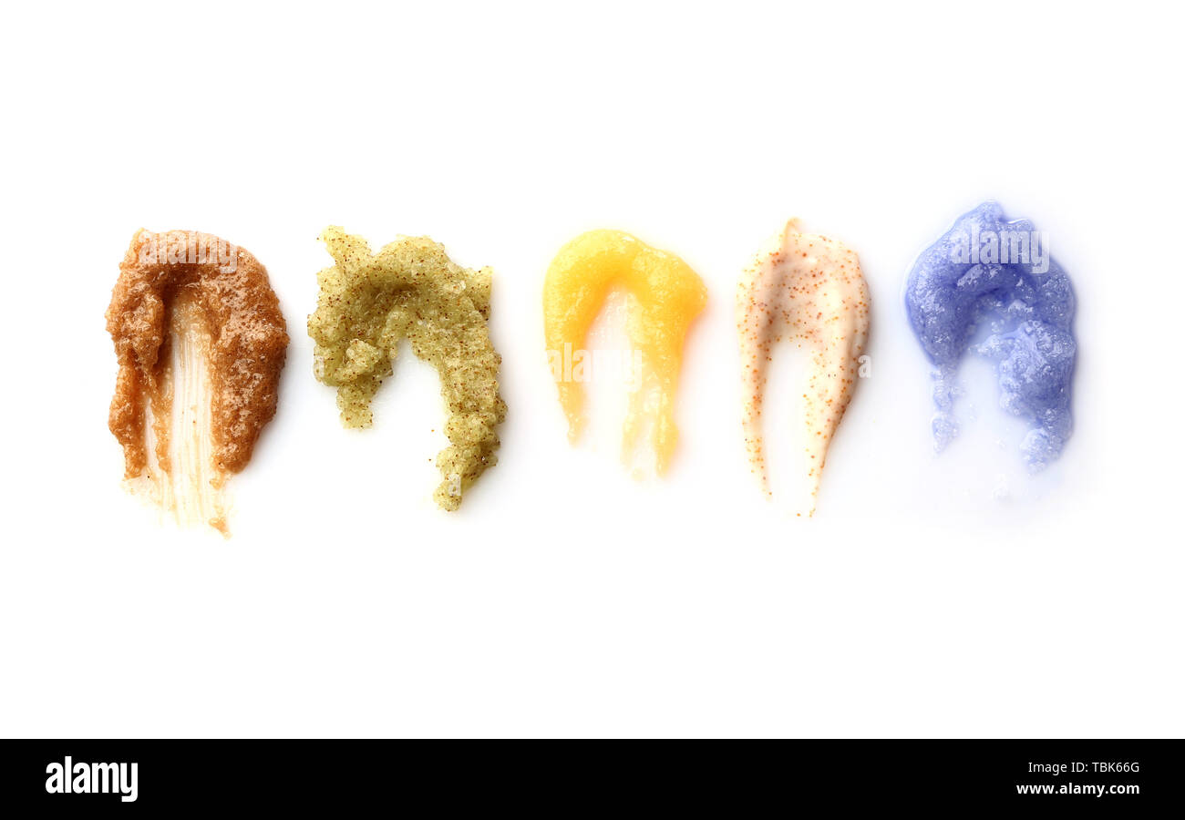 Samples of different sugar scrubs on white background Stock Photo - Alamy