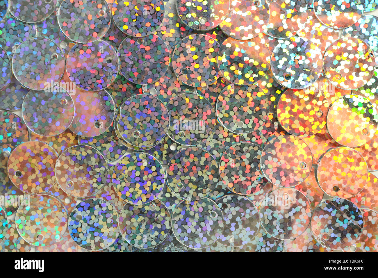 Bright iridescent sequins, closeup Stock Photo - Alamy