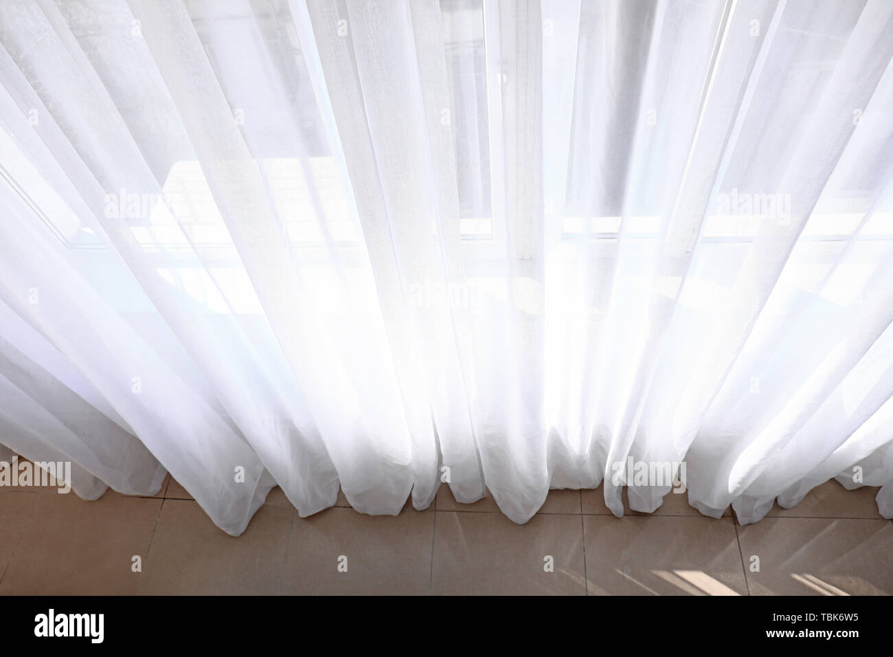 Light curtains in room Stock Photo - Alamy