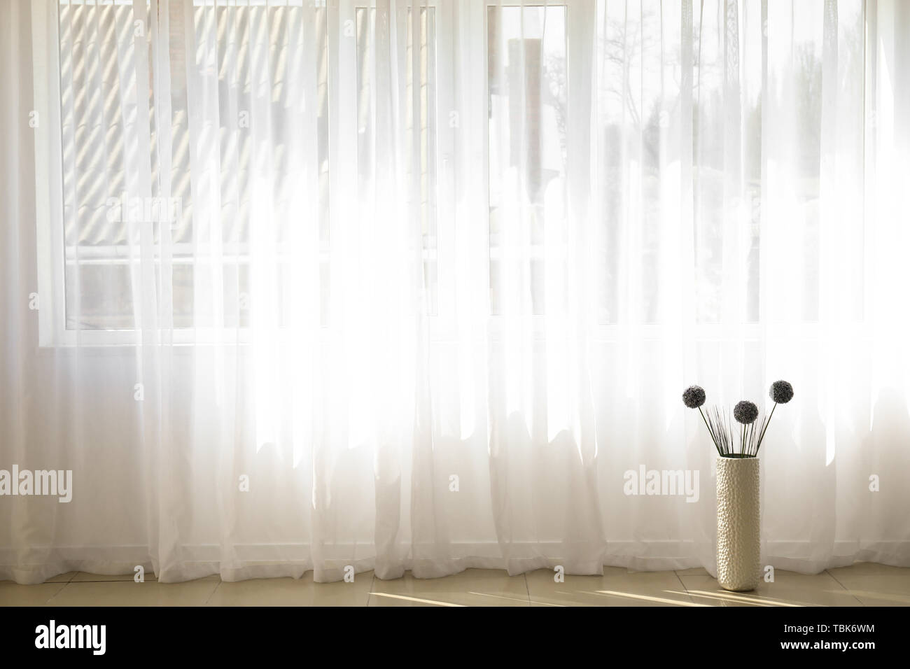 Light curtains in room Stock Photo - Alamy