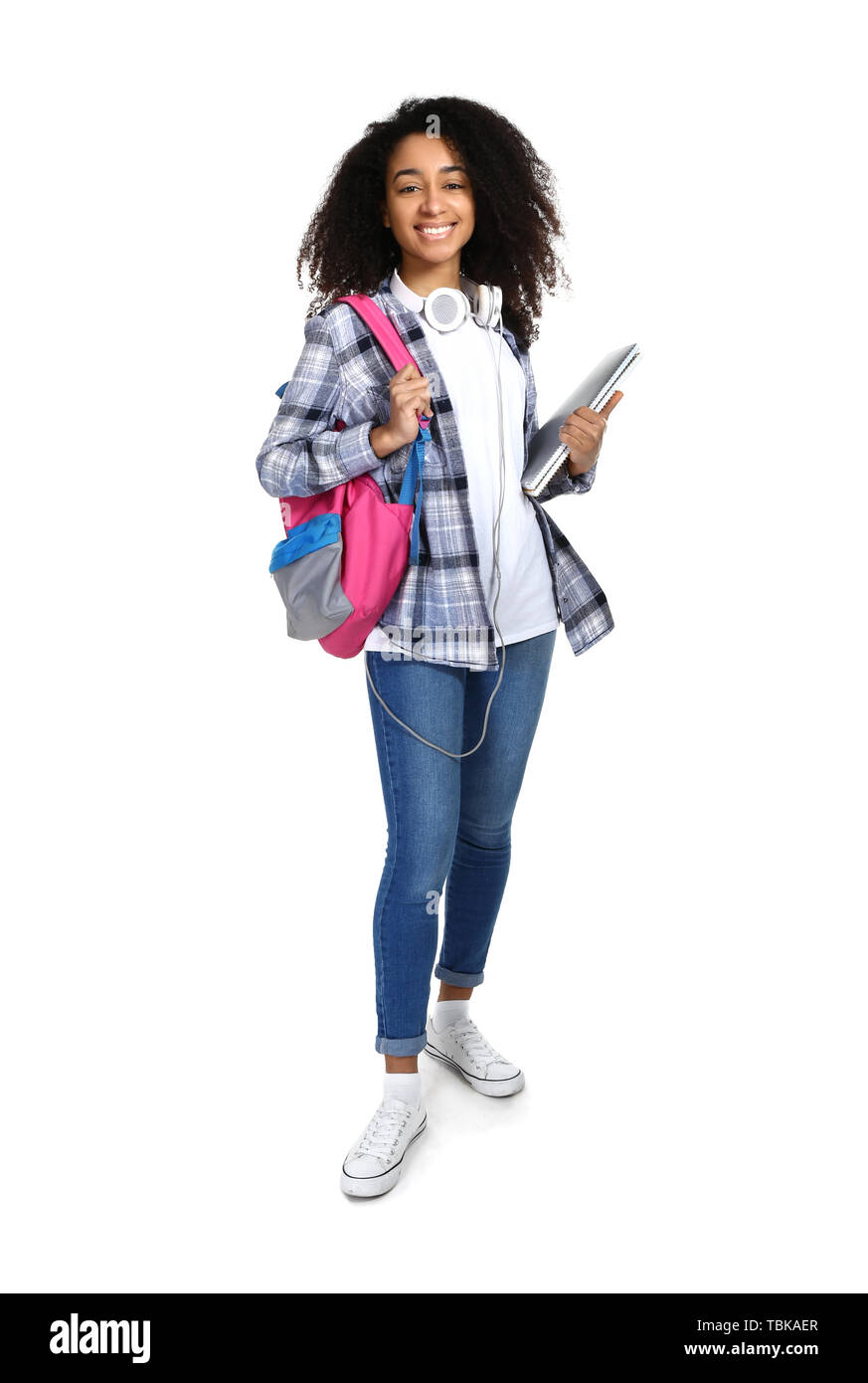 Beautiful African-American student on white background Stock Photo - Alamy