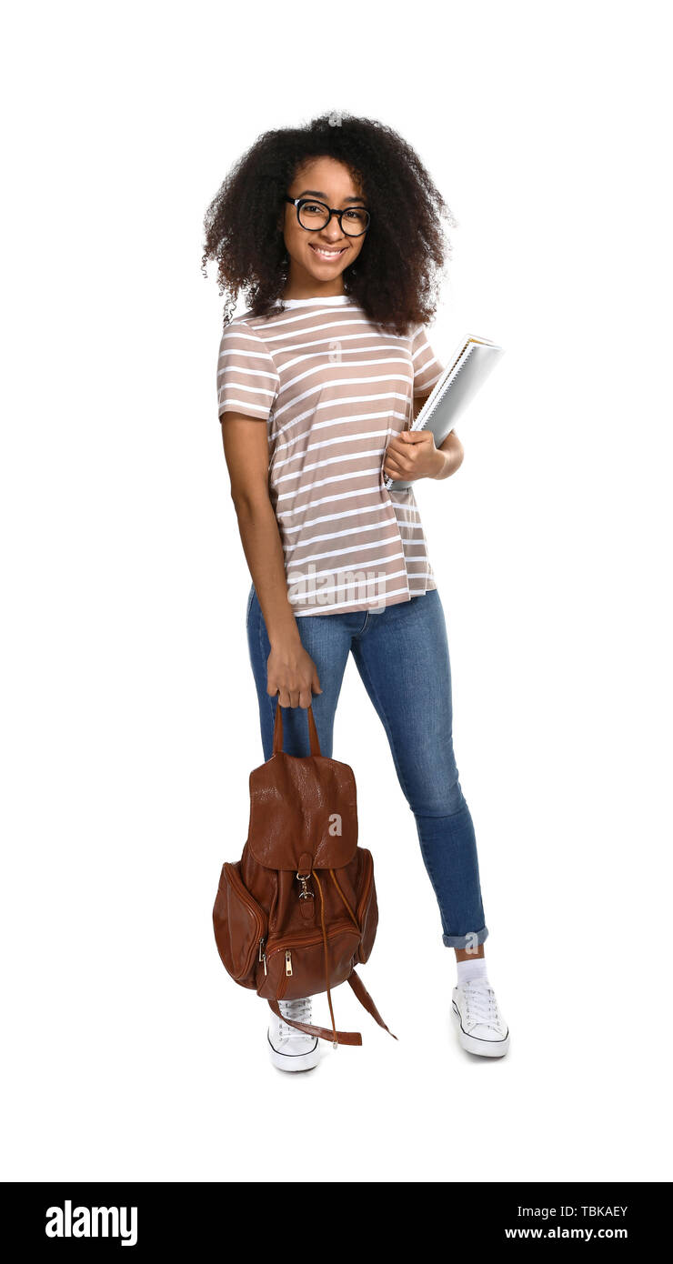 Beautiful African-American student on white background Stock Photo - Alamy