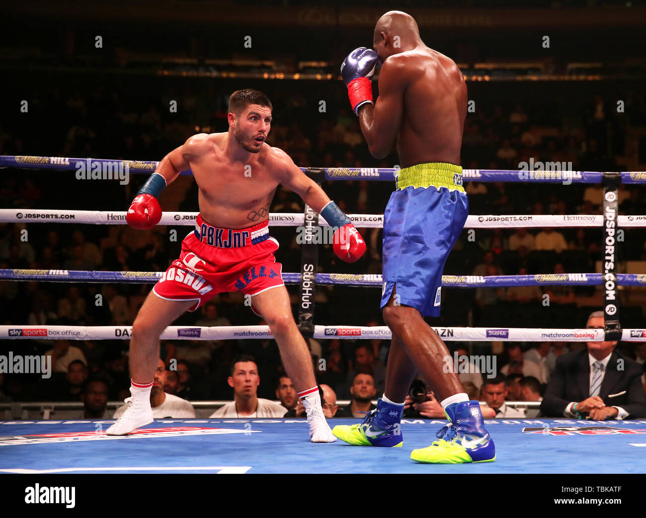 Josh Kelly (left) in action against Ray Robinson in the WBA ...