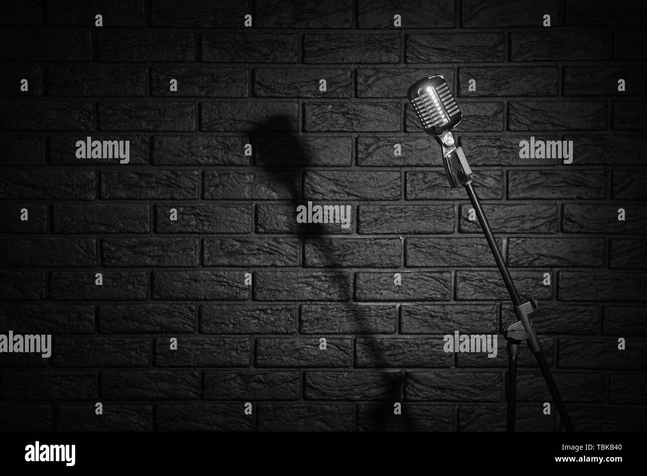 Microphone brick wall Black and White Stock Photos & Images - Alamy