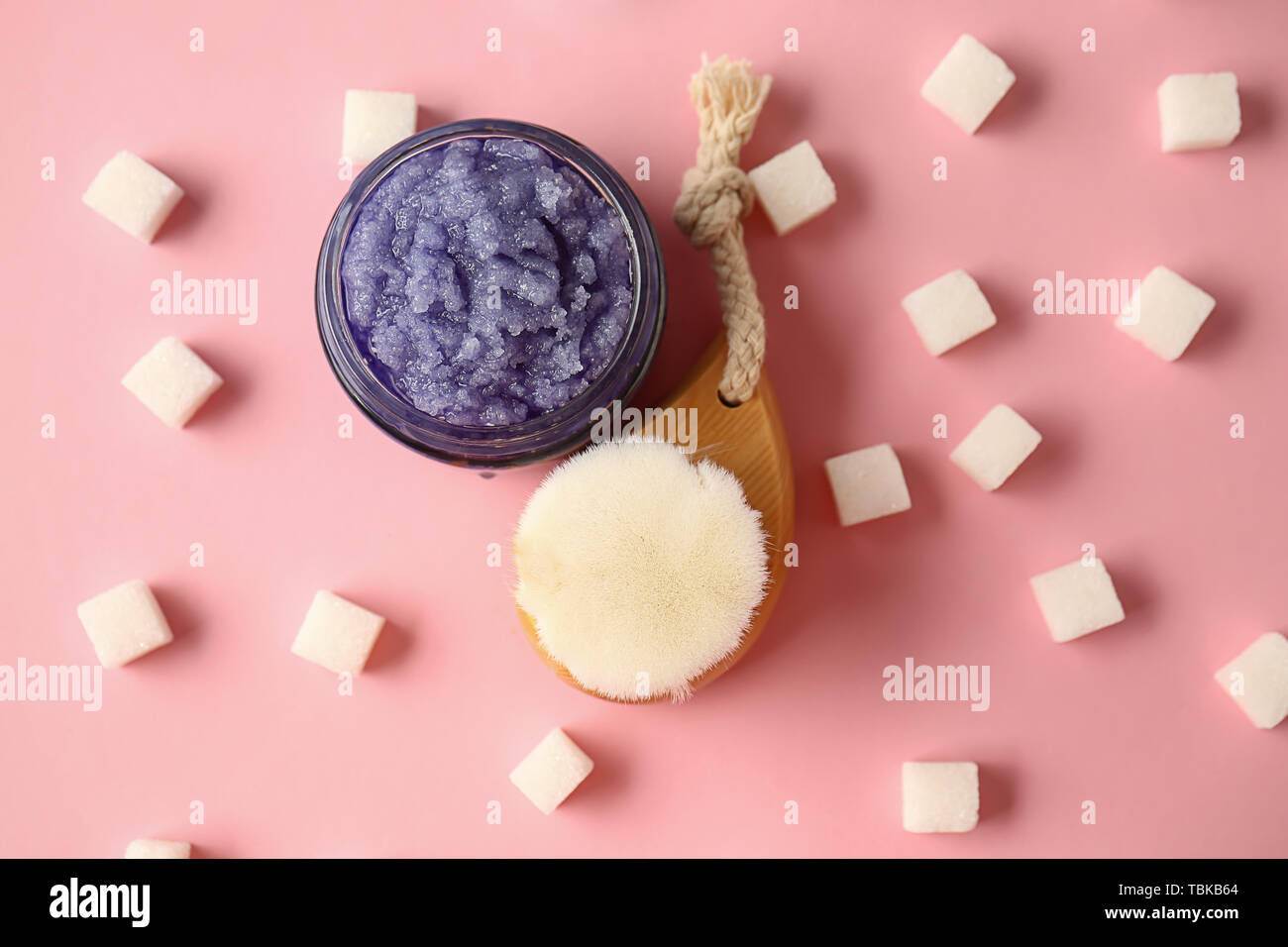 Jar of sugar scrub on color background Stock Photo - Alamy
