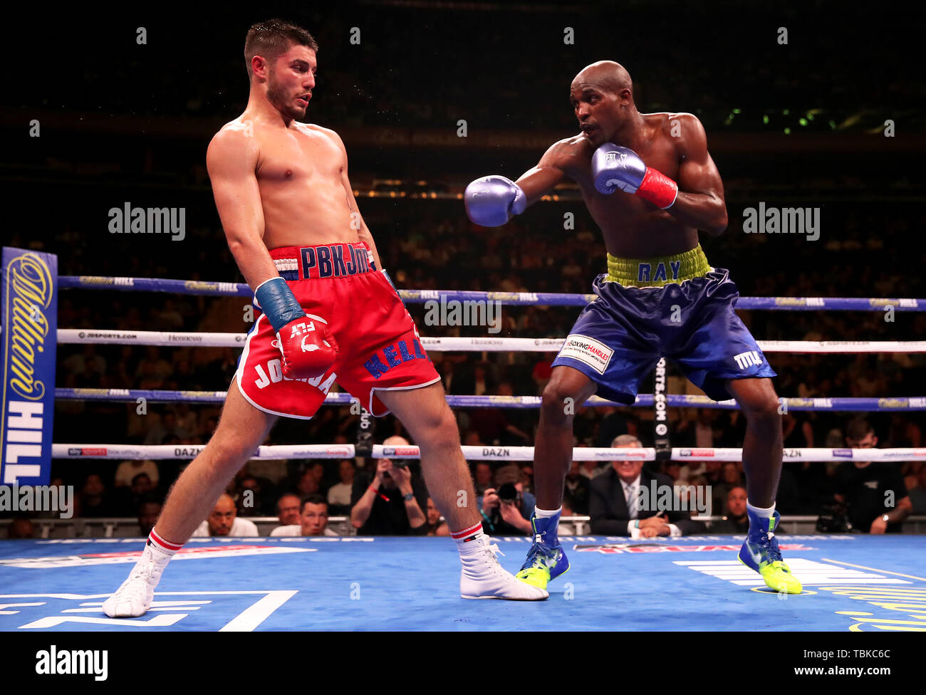 Josh Kelly (left) in action against Ray Robinson in the WBA ...