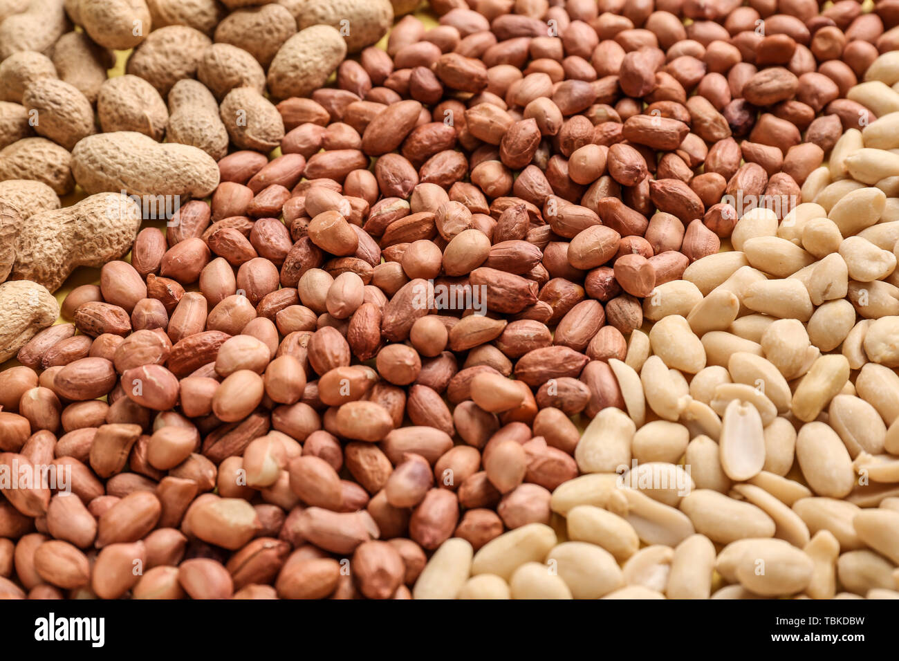 Tasty peanuts as background Stock Photo - Alamy