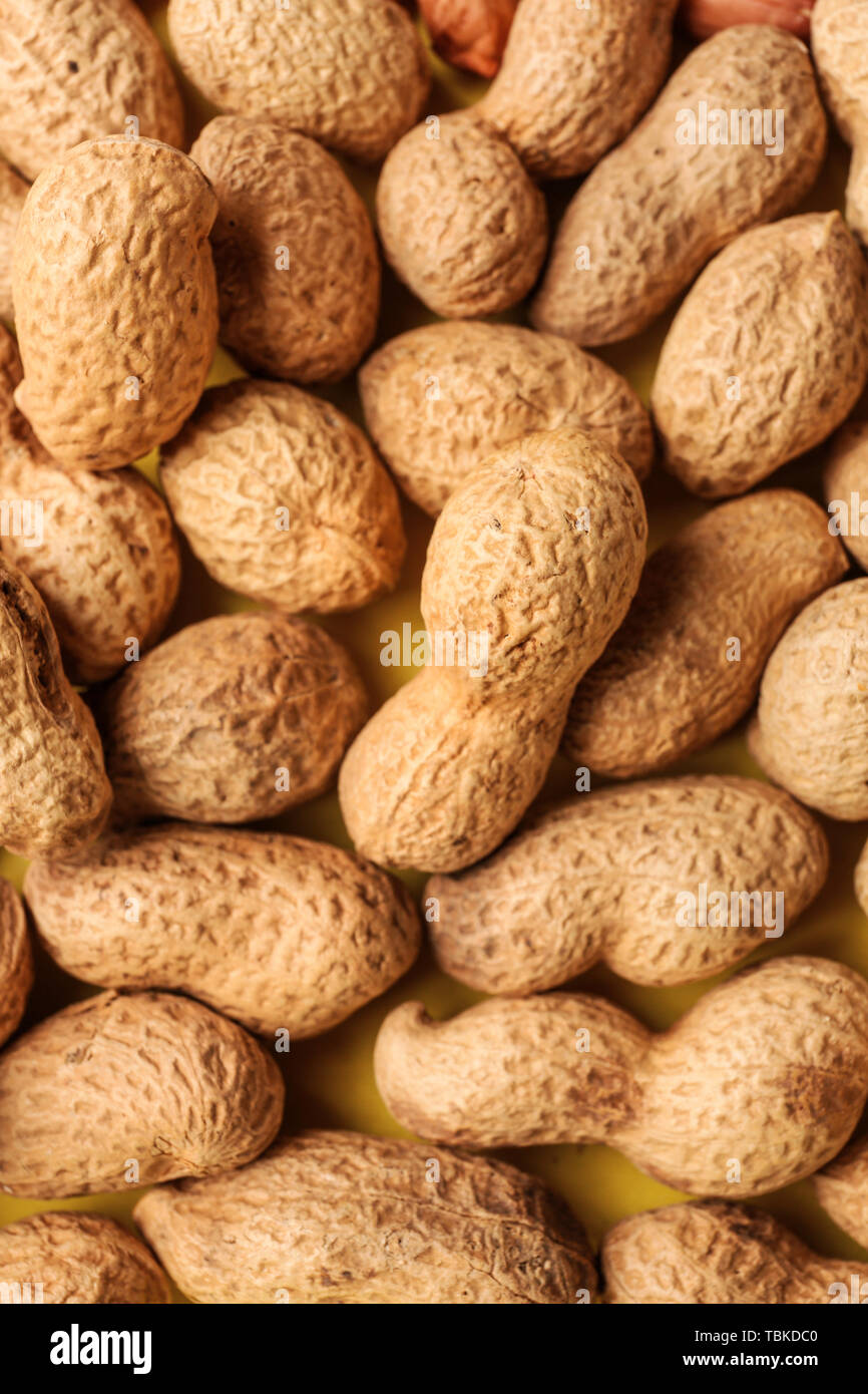 Tasty peanuts as background Stock Photo - Alamy