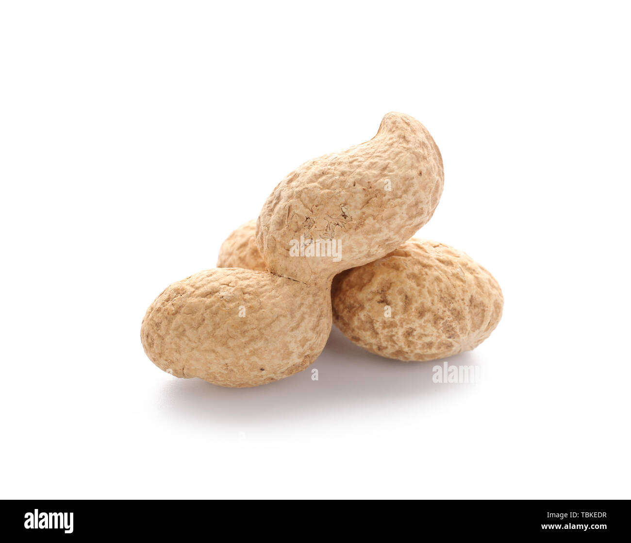 Tasty peanuts on white background Stock Photo - Alamy